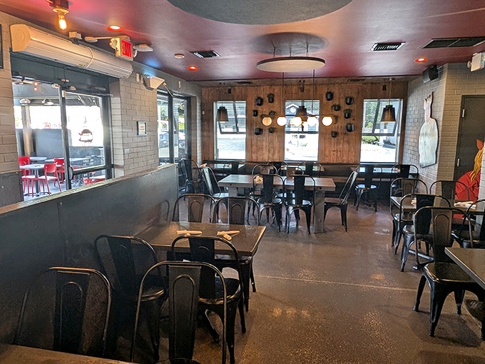 Modern industrial meets cozy comfort in this dining room where the only thing better than the atmosphere is knowing what's about to arrive at your table.