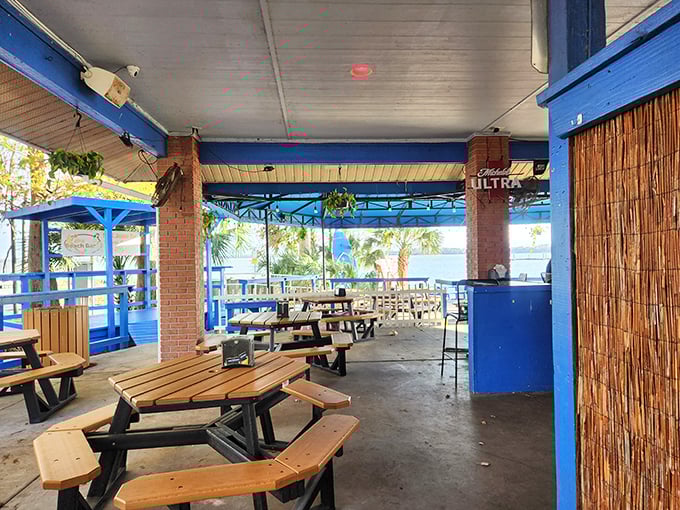 Picnic tables with a million-dollar view. The bamboo screens aren't just decorative – they're strategic wind-blockers for those perfect hair selfies.