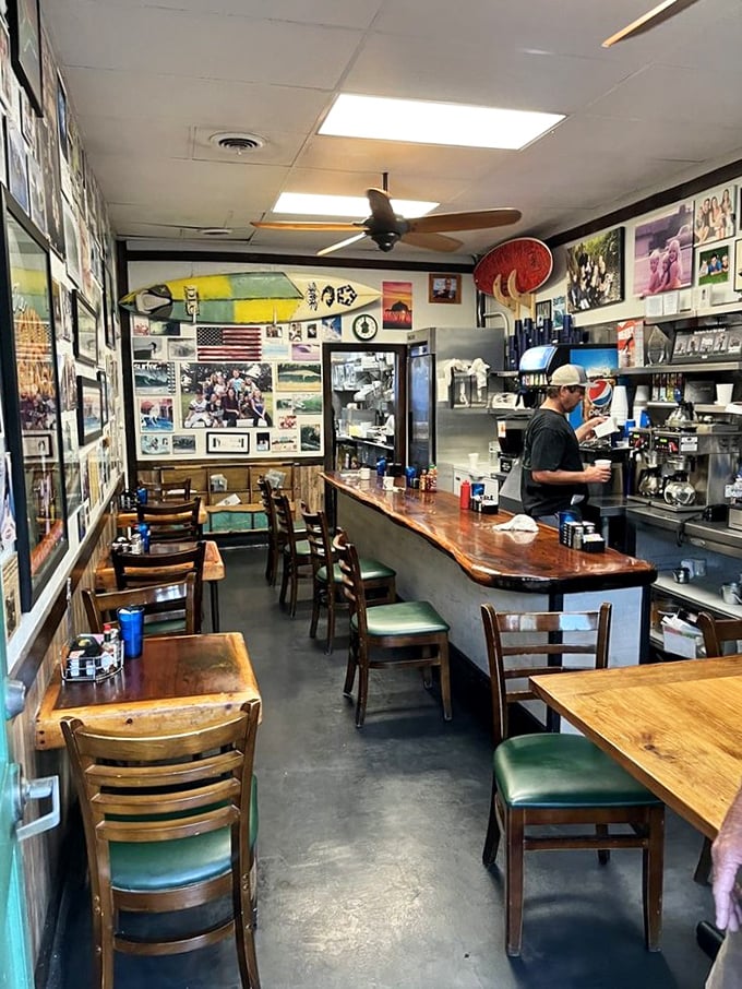 The narrow dining room feels like being invited into someone's carefully curated memory lane, where every meal adds another story to the collection.