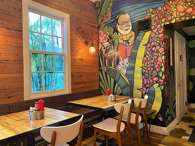 Hemingway would approve of this corner table beneath his colorful portrait—the perfect spot to pen your next great American novel or just enjoy your eggs Benedict.