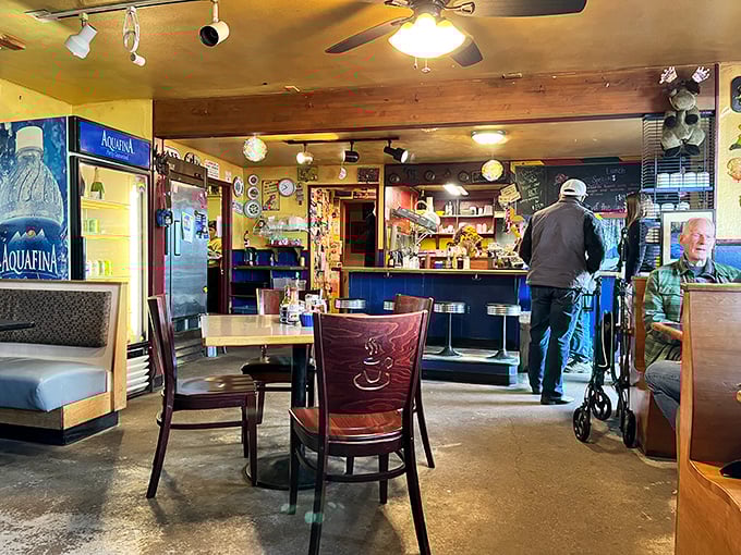 No designer touched this space – it evolved organically over years of "let's hang this here" decisions that somehow created the perfect breakfast ambiance.