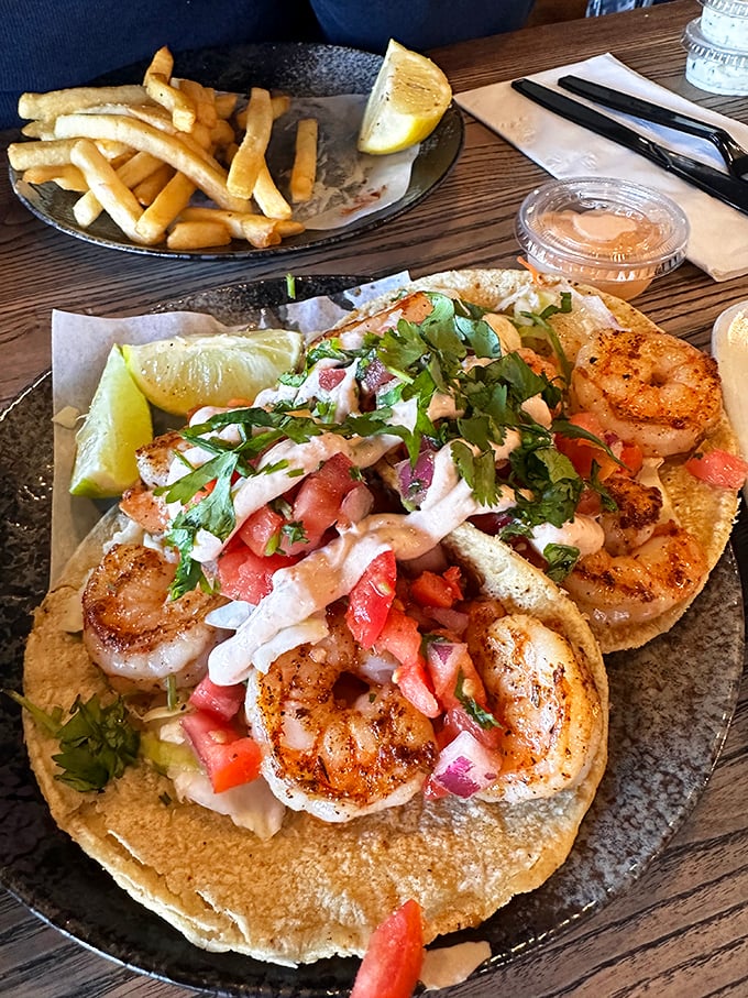 These shrimp tacos aren't just a meal—they're a California dream, where perfectly seasoned crustaceans meet fresh toppings in tortilla harmony.