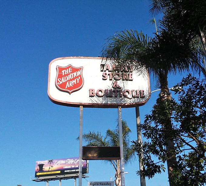 The iconic Salvation Army shield stands tall against the San Diego sky—a beacon for bargain hunters and donation-minded citizens alike.