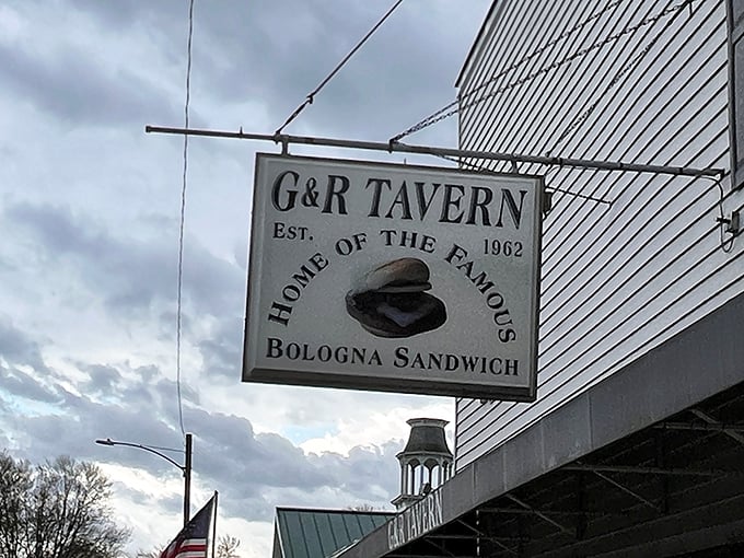 The vintage hanging sign announces your arrival at bologna paradise – simple, straightforward, and promising satisfaction since 1962.