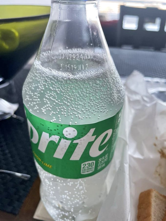 Even a simple Sprite becomes part of the ritual—the crisp, bubbly counterpoint to all that rich, smoky barbecue.