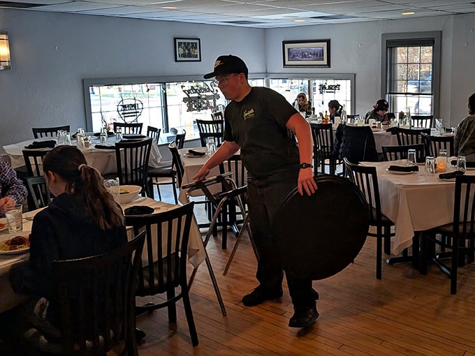 Service with a smile and a purpose—getting that delicious food to your table while it's still piping hot!