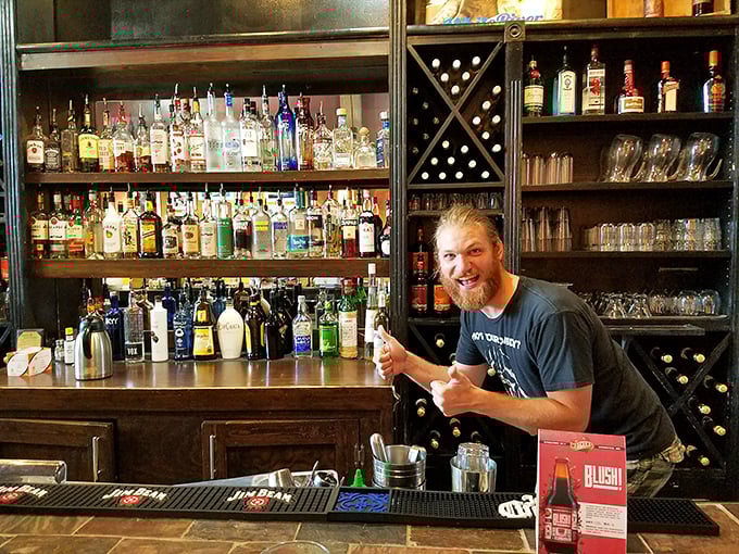 The thumbs-up says it all—when your bartender is this happy, you know you've found the right place to unwind.