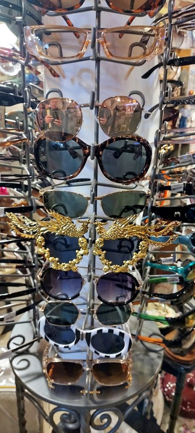 Sunglasses galore! From practical protection to "who do I think I am?" glamour, this rotating rack of personality enhancers proves style is truly in the eye of the beholder.