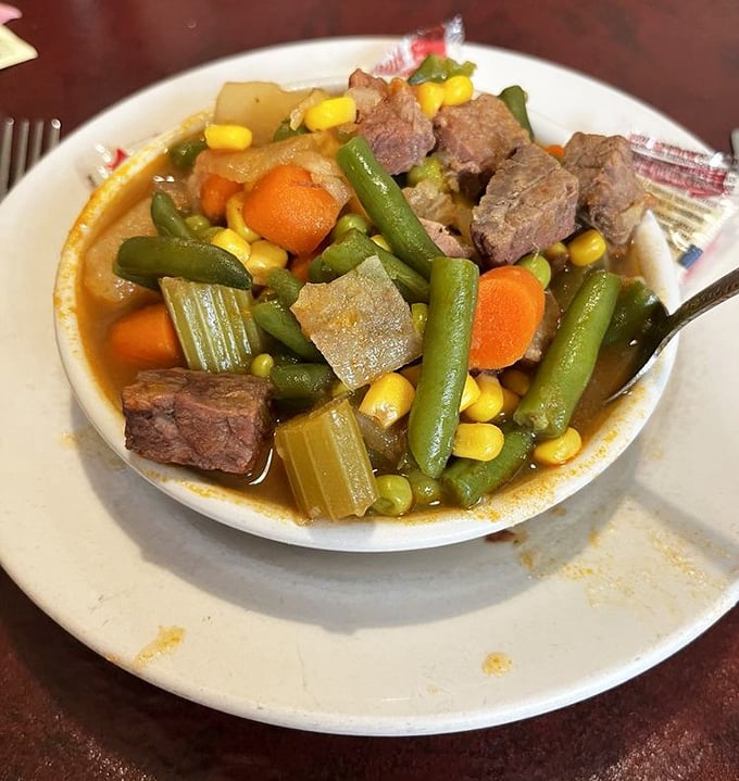 Vegetable beef soup that's had a long, meaningful relationship with the stockpot—chunks of beef and vegetables telling their delicious story.