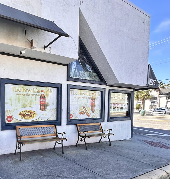 Benches outside where the breakfast-hopeful wait their turn, contemplating the life-changing decisions that await inside: waffles or omelets? 