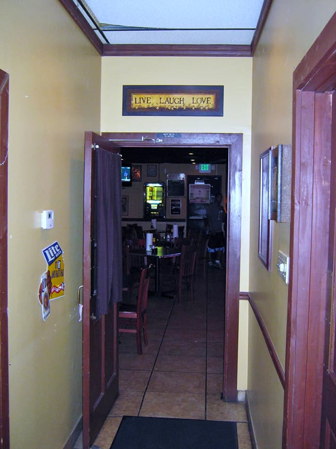 Live, Laugh, Love sign above the entrance—because that's exactly what happens when you gather friends around plates of exceptional barbecue.