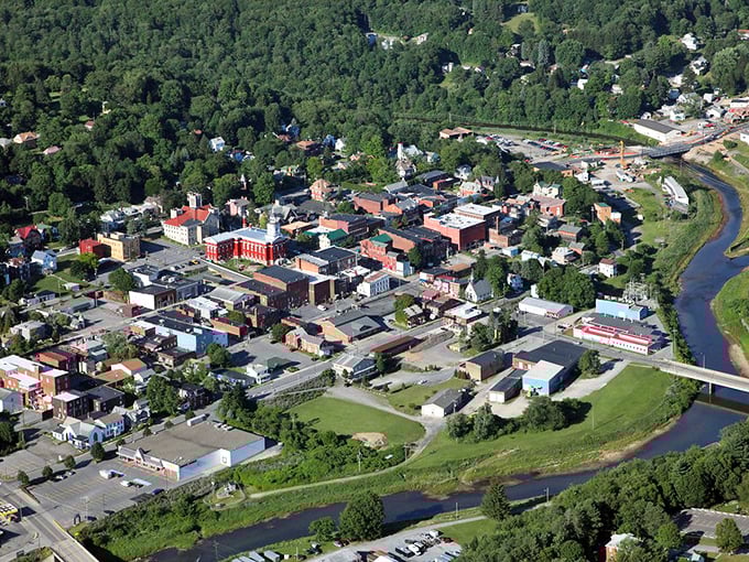 This aerial view reveals Brookville's perfect positioning—nestled alongside waterways and surrounded by verdant Pennsylvania forests that provide free entertainment year-round.