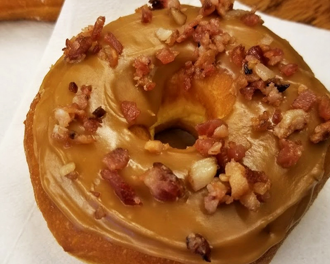 The maple bacon donut—where breakfast meets breakfast in a mind-bending flavor collision. Sweet, savory, and utterly shameless in its decadence.