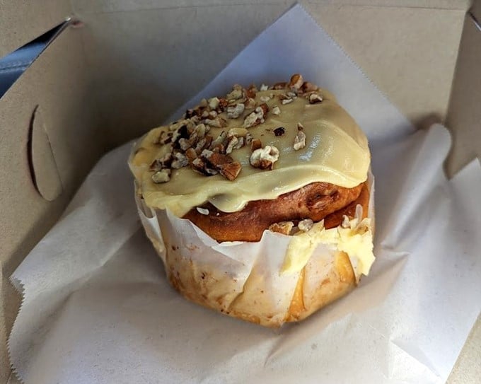 This isn't your average bagel—it's a Czech-inspired revelation topped with creamy frosting and pecans that makes New York's finest seem like mere bread circles.
