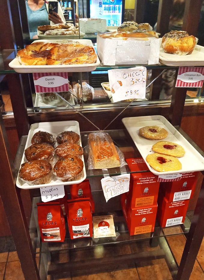 The dessert case—a glass-enclosed museum of temptation where willpower goes to die and "I'll just have a bite" becomes a beautiful lie.