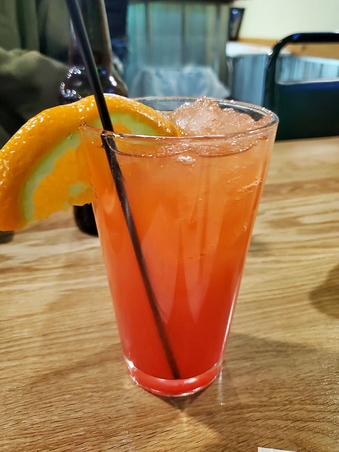 That sunset-colored cocktail isn't just a drink – it's the perfect prelude to the main event, garnished with anticipation.