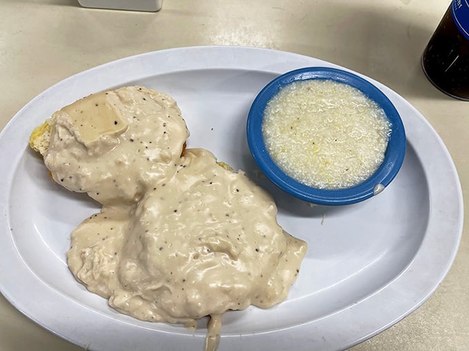Biscuits smothered in creamy pepper gravy—a dish so comforting it should be prescribed by therapists for what ails you.
