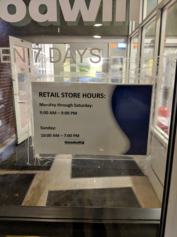 The store hours sign—memorize these numbers like winning lottery digits if you want first dibs on the freshly stocked merchandise.