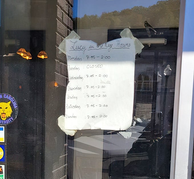 The handwritten hours sign—closed Tuesdays—is the kind of charming detail that reminds you this isn't some soulless chain restaurant operation.