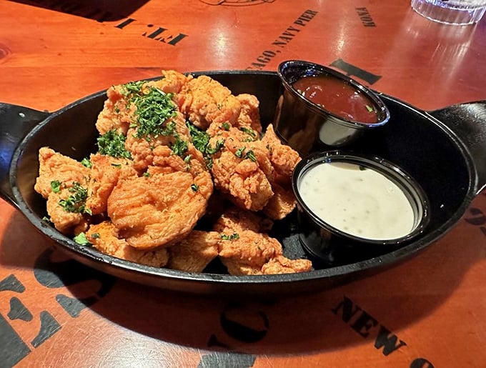 These aren't just chicken tenders; they're golden tickets to comfort food heaven, served with dipping sauces for your dunking pleasure.
