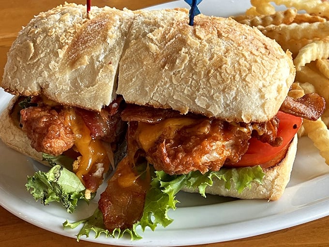This isn't just a sandwich—it's architecture with attitude, where crispy chicken and fresh veggies create the skyscraper of lunch options. 