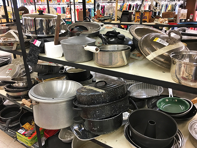 Cookware heaven for culinary enthusiasts—those speckled enamel pots have stories to tell and meals yet to make.