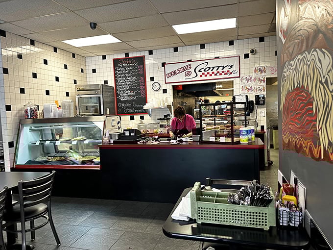 The welcoming counter area with its handwritten specials board is where the magic happens—where orders are called and comfort food dreams come true.