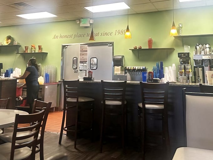 Counter seating with a view of the coffee station—the breakfast equivalent of front-row seats at your favorite concert venue.