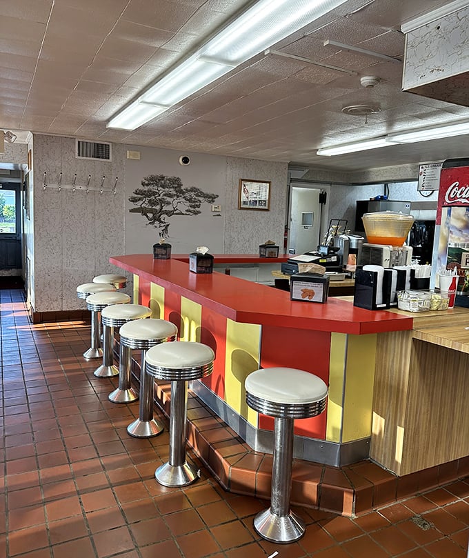 The counter with its classic diner stools invites you to belly up for a meal that hasn't changed because it never needed to.