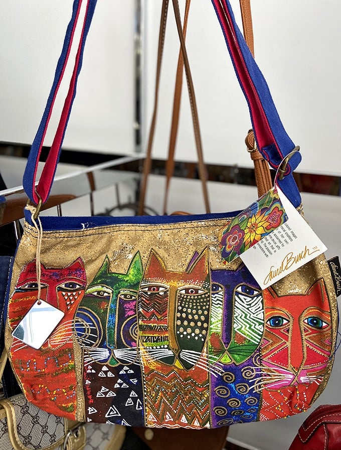 This Laurel Burch cat purse isn't just an accessory—it's wearable art with enough personality to be your plus-one.