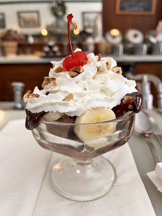 This banana split sundae isn't just dessert—it's therapy in a glass dish, complete with whipped cream clouds and a cherry on top for good measure.