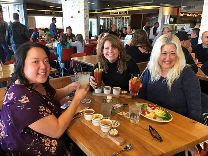 Happy diners raising glasses to good company and better food—the universal language of a restaurant that's hitting all the right notes.