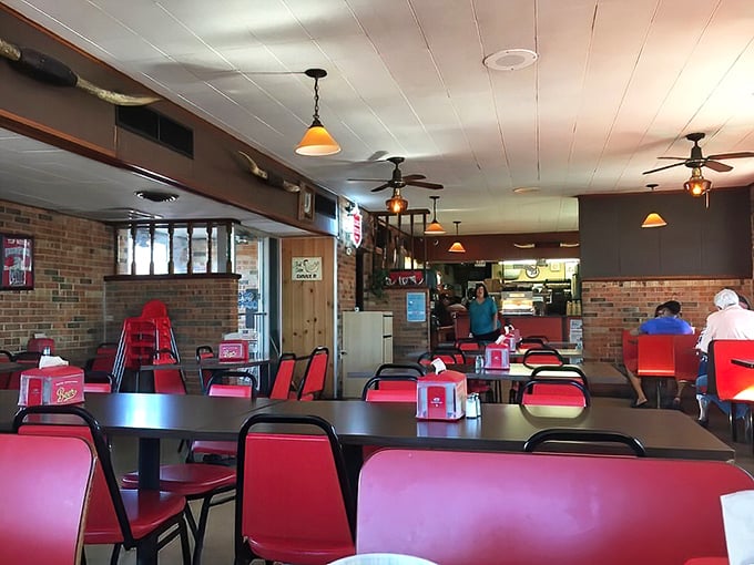 The spacious dining room with its retro color scheme welcomes everyone from solo diners to entire family reunions comfortably.