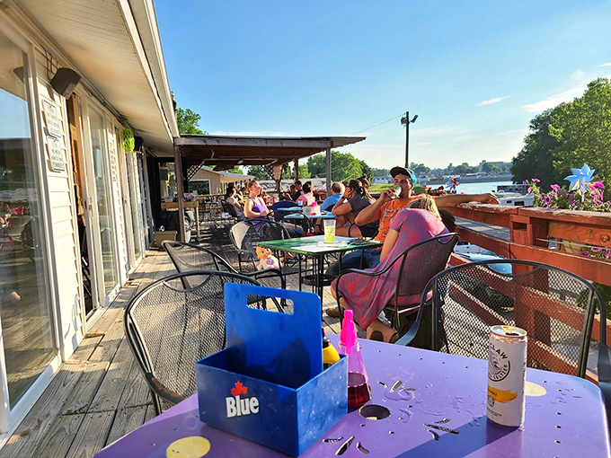 The outdoor patio offers waterside dining where summer breezes complement the fresh catch of the day.
