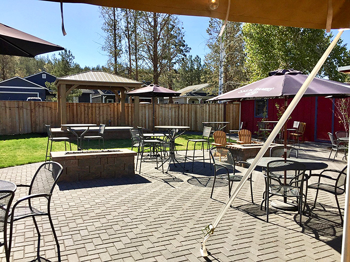 Oregon sunshine meets outdoor dining on this perfect patio. Those umbrellas aren't just for shade—they're for extending your steak enjoyment into the great outdoors.