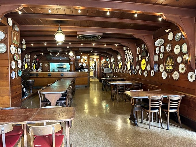 The dining room's collection of plates tells stories while you create your own seafood memories.