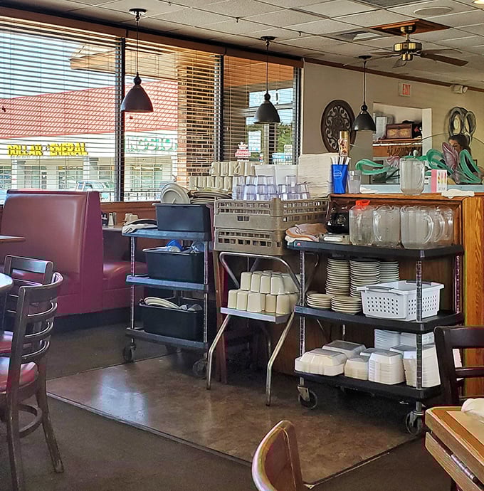 The unsung heroes of the diner experience: stacks of plates and cups standing at attention, ready for their moment in the breakfast spotlight. 