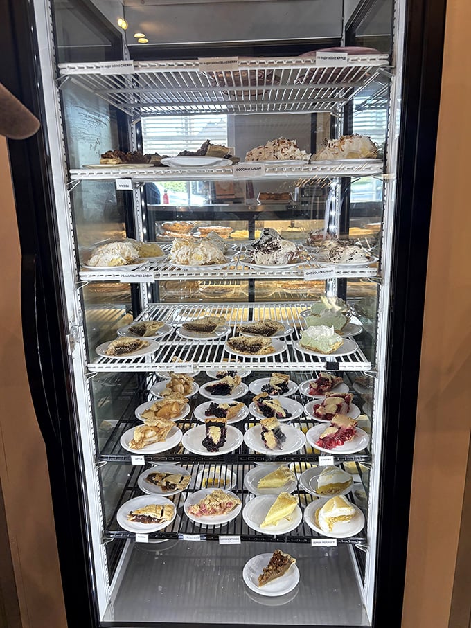 Pie paradise! This display case holds more happiness per square inch than most amusement parks. Decision paralysis has never been so delicious.