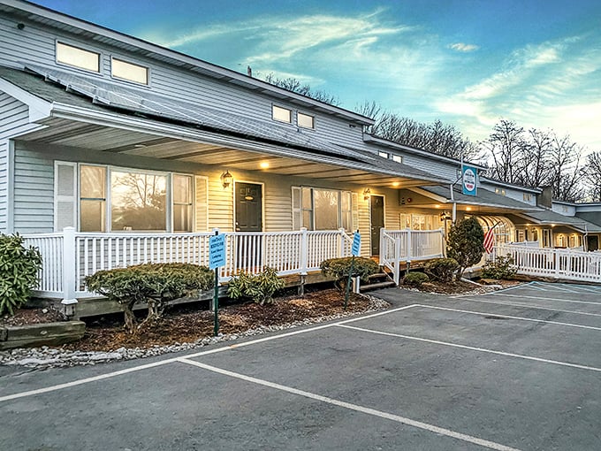 East Shore Lodging offers that quintessential mountain getaway vibe. Those white railings have supported countless vacationers leaning out to breathe in lake air.