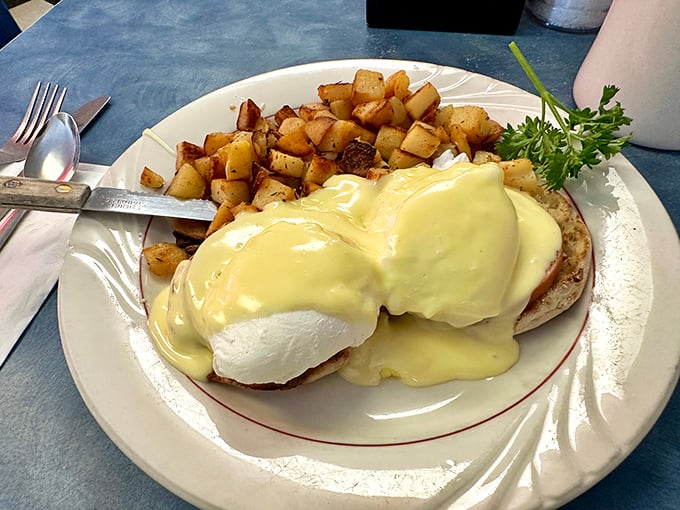 Eggs Benedict: where hollandaise sauce flows like liquid gold over poached eggs and English muffins – breakfast's answer to formal wear.