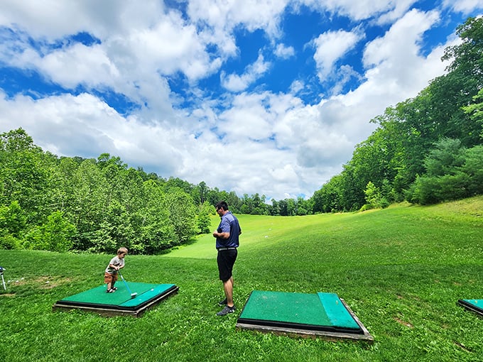 Emporium Country Club's mini-golf area turns family competition into memory-making, with mountains providing a backdrop no designer could improve upon.