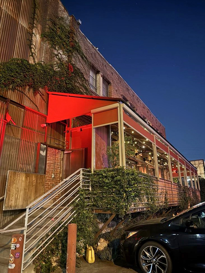Night transforms Bestia's entrance into something magical. That red awning is like a runway light guiding hungry pilots to a safe landing.