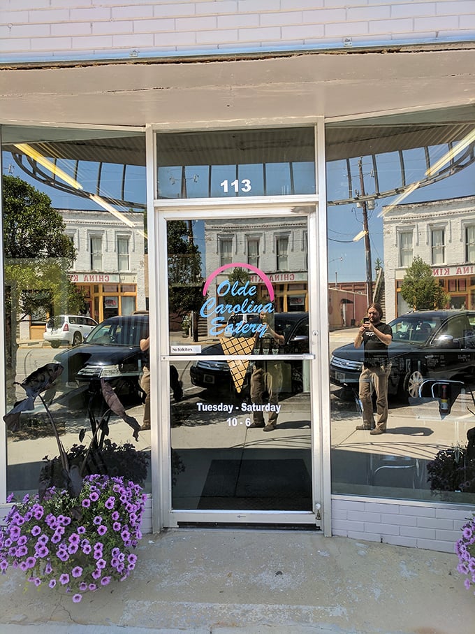 The cheerful storefront with its ice cream cone logo promises simple pleasures inside – no molecular gastronomy, just food that makes you feel good.