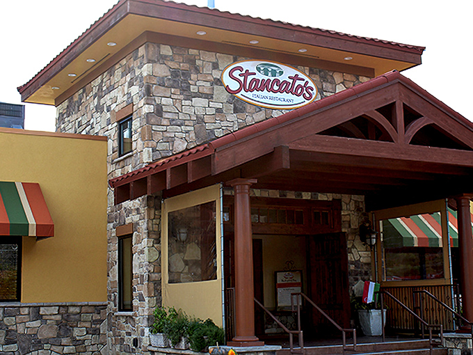The entrance proudly announces what awaits inside – an Italian-American institution where hunger goes to meet its delicious match.