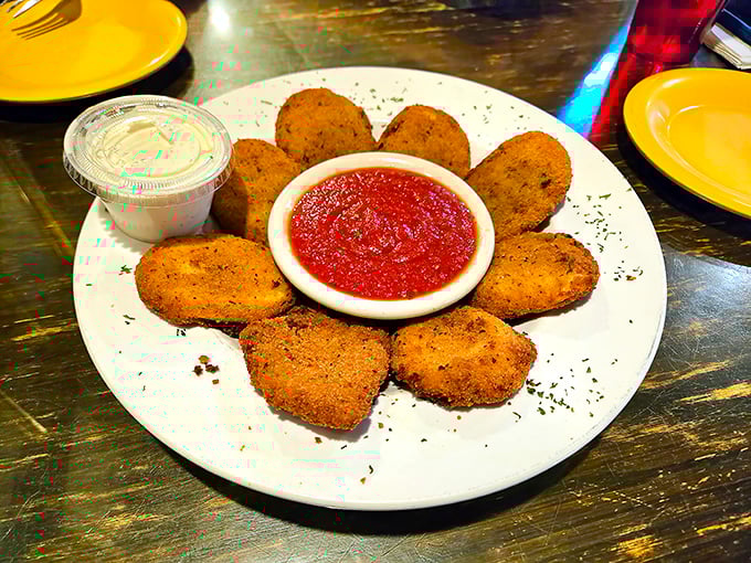 Fried ravioli arranged like a sunburst—because appetizers should make you smile before you even taste them.