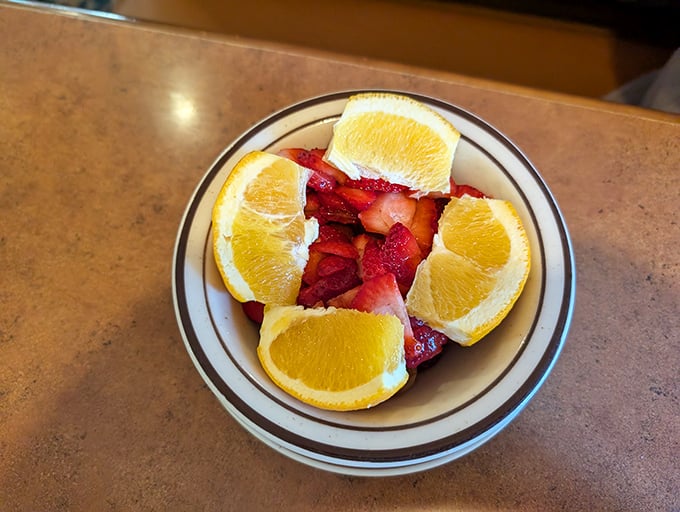 Fresh fruit that actually looks fresh—a small miracle in the breakfast world and the perfect companion to heavier indulgences.