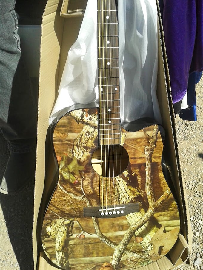 This isn't just a guitar—it's a campfire storyteller disguised as an instrument, its camouflage finish practically begging for starlit desert jam sessions.