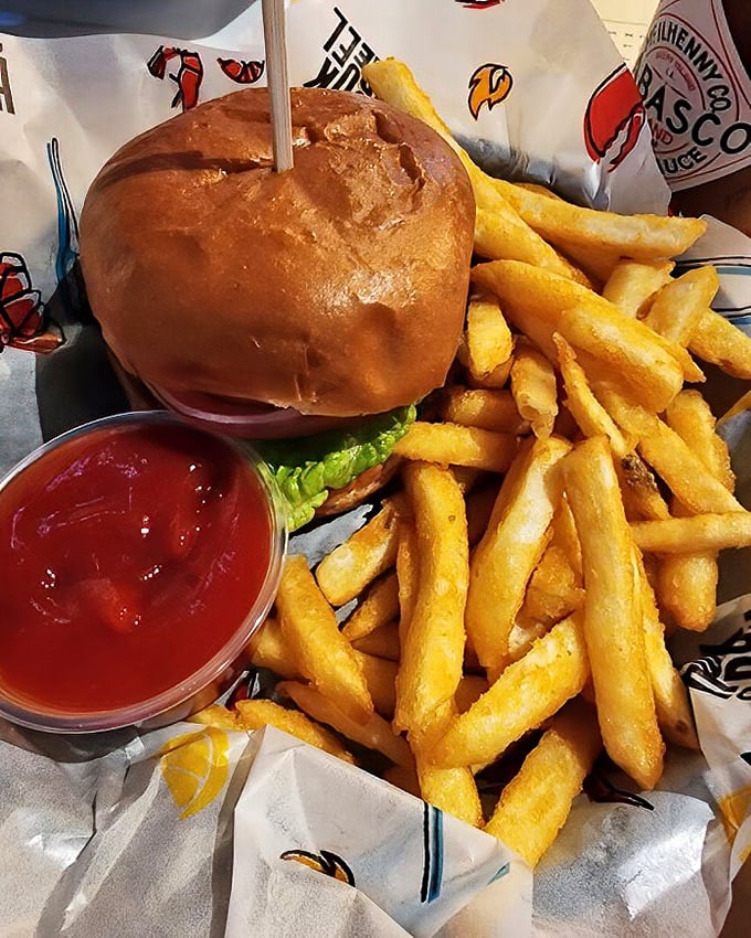 Burger perfection doesn't need to be complicated. Golden fries, a pillowy bun, and a side of sauce – sometimes simplicity wins. 