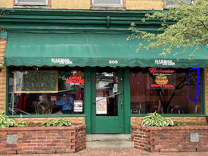 The Harmar Tavern's unassuming facade hides what locals know: sometimes the most memorable meals happen where the neon beer signs outnumber the menu items.