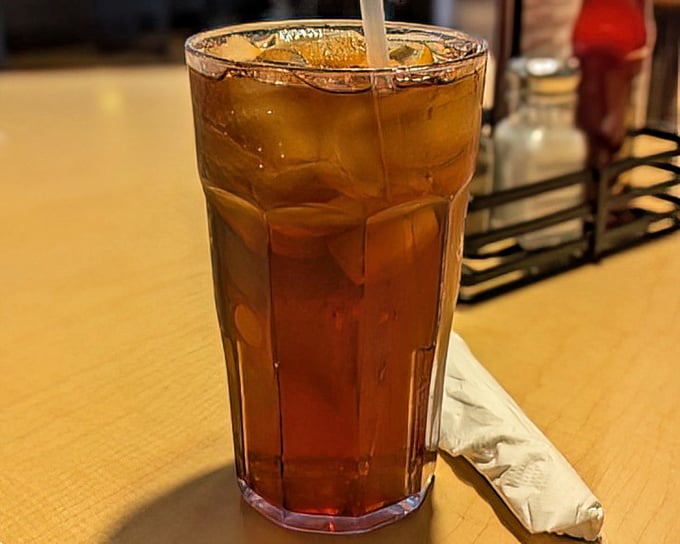 An amber glass of iced tea—the perfect companion to cut through the richness of gravy-laden comfort food. Simple pleasures at their finest.